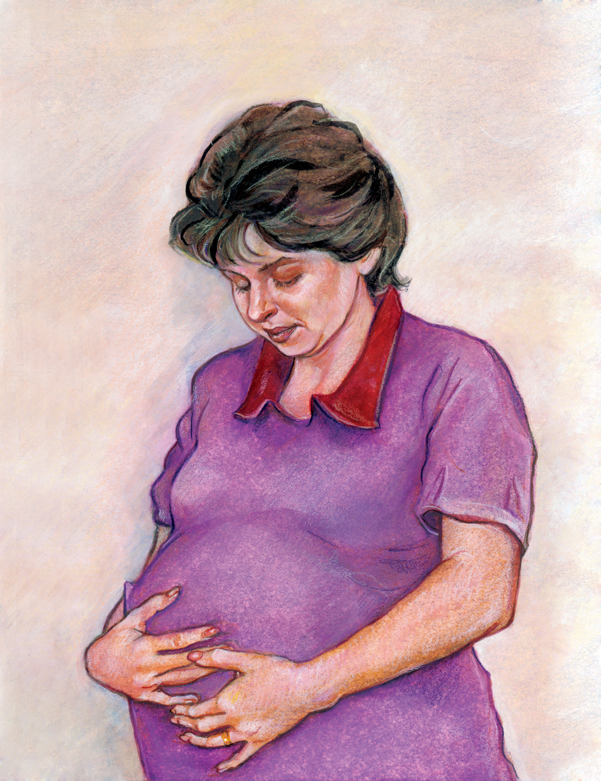 A pregnant woman holding her belly | Media Asset | NIDDK
